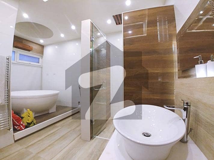 One kanal Facing Park just 2 year old House In Phase 4 FF Block DHA ...