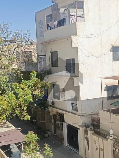 GROUND plus 3 HOUSE BOUNDARY WALL SOCIETY University Road, Karachi ...