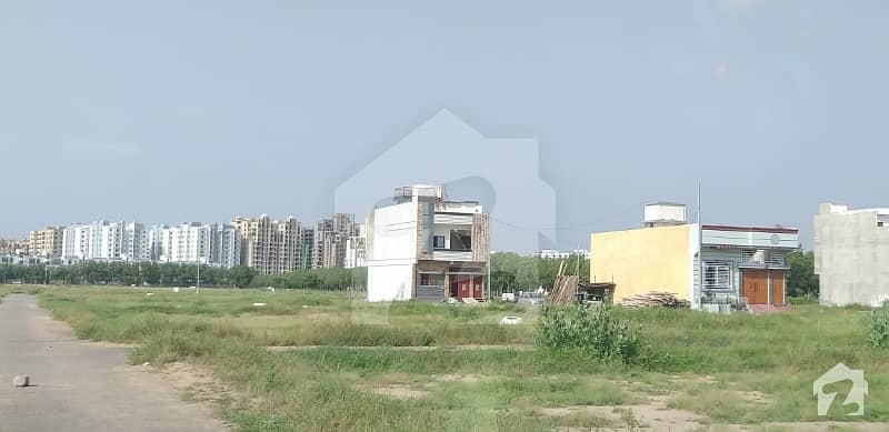 100 yard plot commercial main location by legal estate Gulshan-e-Roomi ...